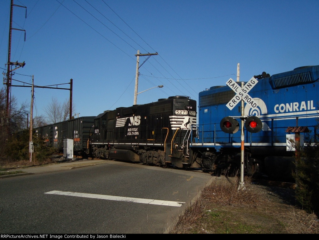 Pulling a sizable train, NS 5271 crosses Snowhill St.